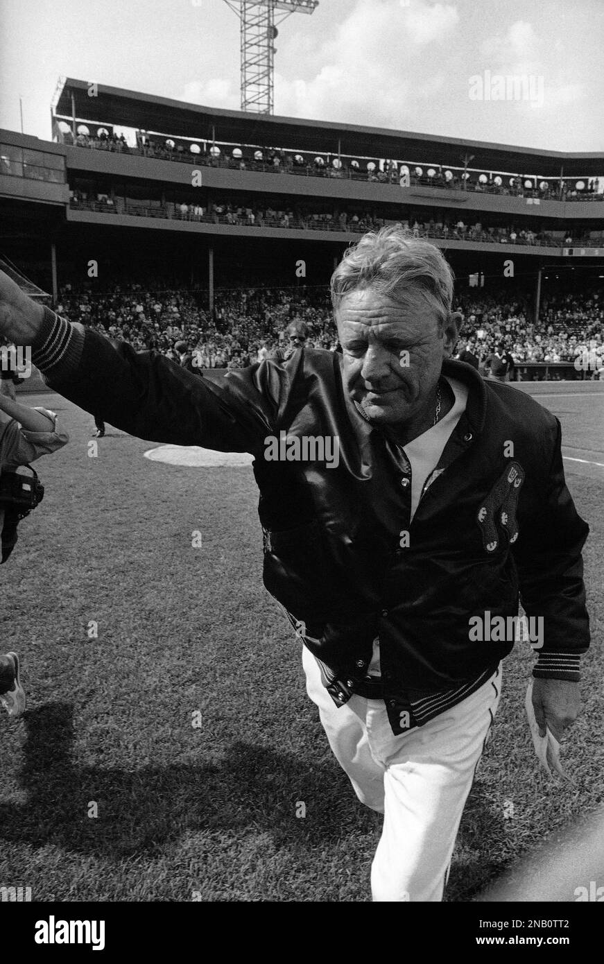 Boston Red Sox Manager Ralph Houk waves to the fans at Fenway Park in ...