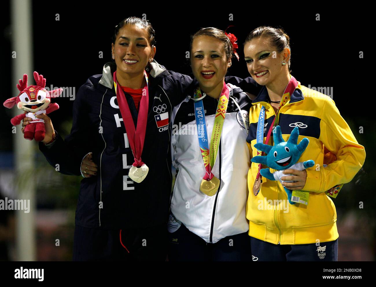 Athletes, from left, Chile's Marisol Villarroel, silver medal ...