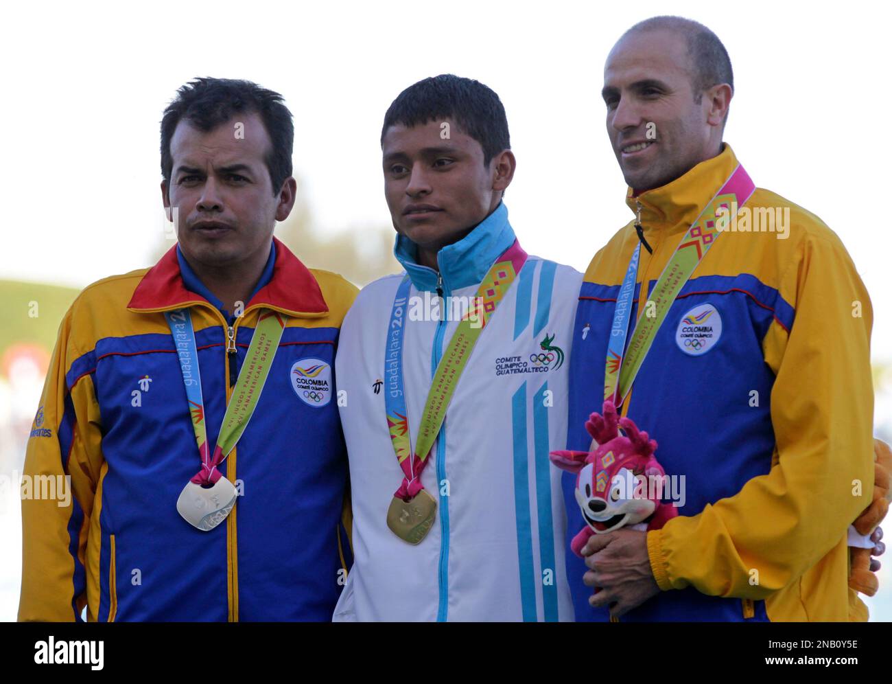 Athletes, from left, Colombia's James Rendon, silver medal, Guatemala's ...