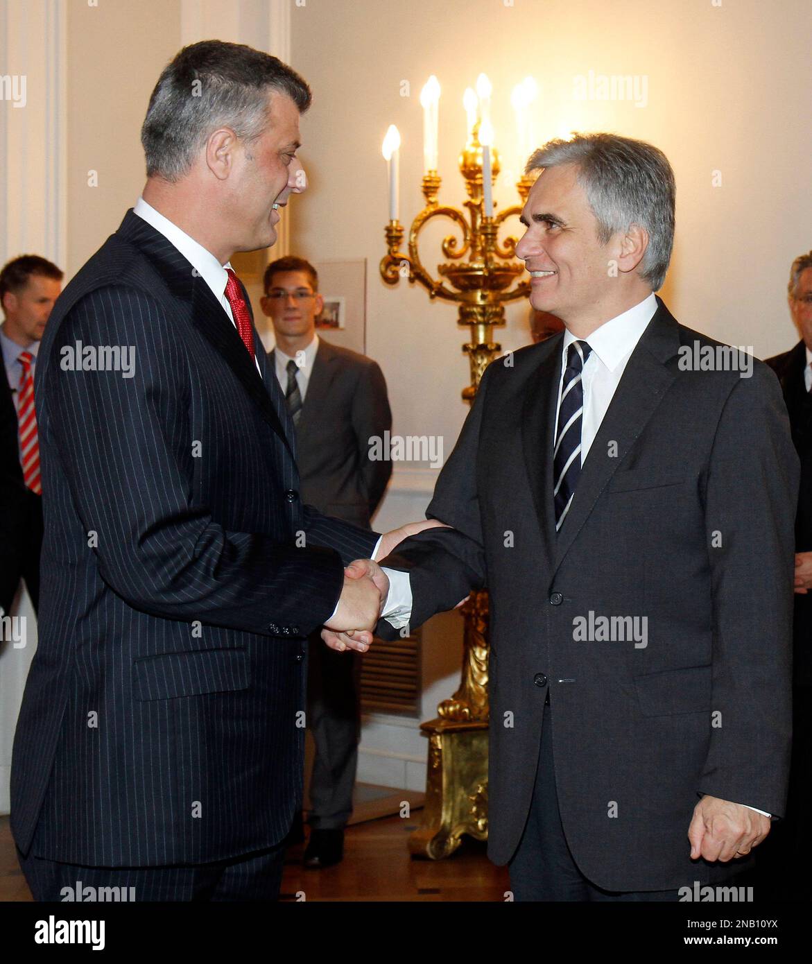 Austrian Chancellor Werner Faymann, right, welcomes Kosovo Prime ...