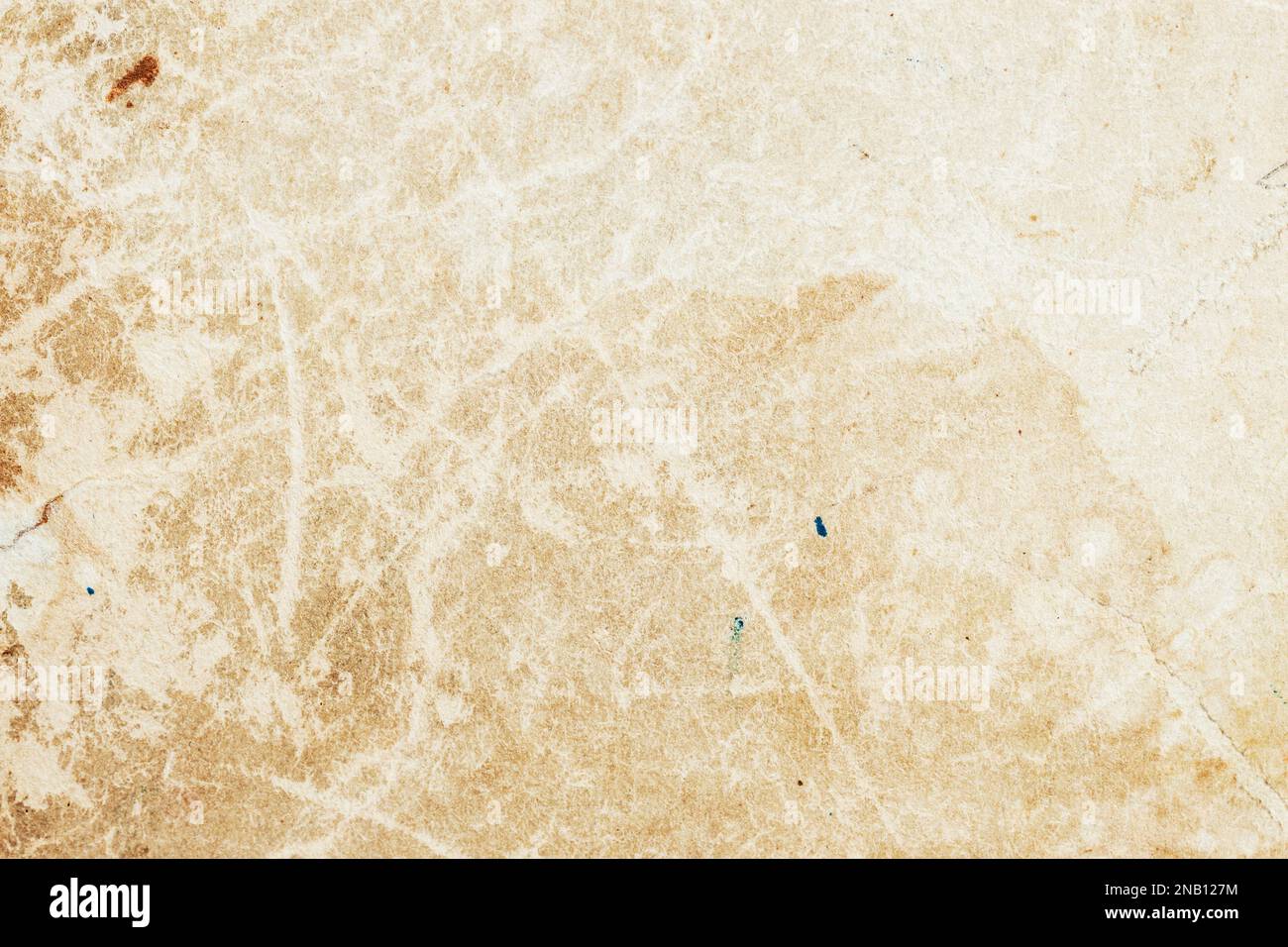 Aged and worn paper texture, grunge background, dirt surface with spots ...