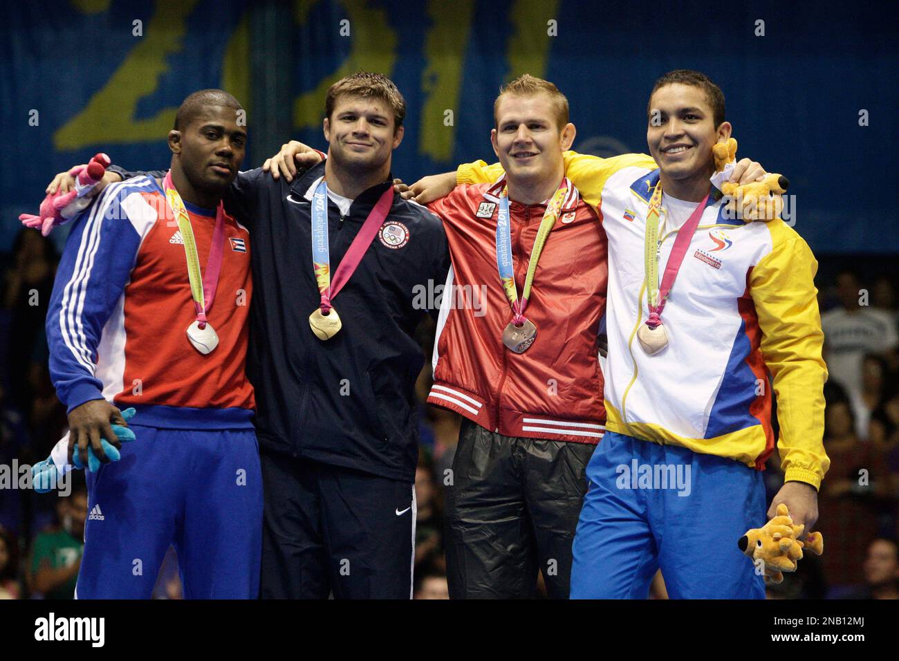 Gold medalist Jacob Herbert, of the United States, center left, silver ...