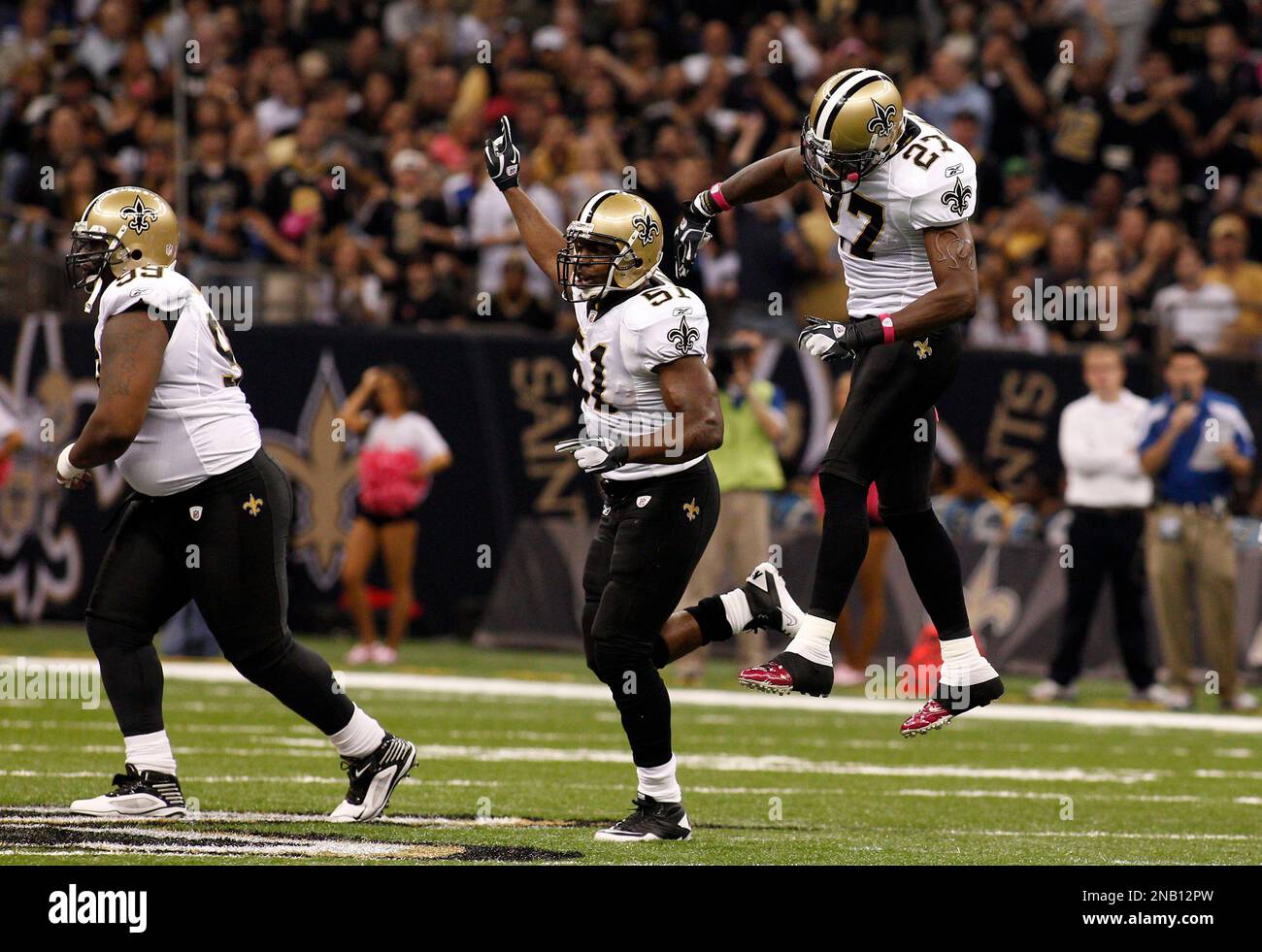 New Orleans Saints middle linebacker Jonathan Vilma (51) celebrates his ...