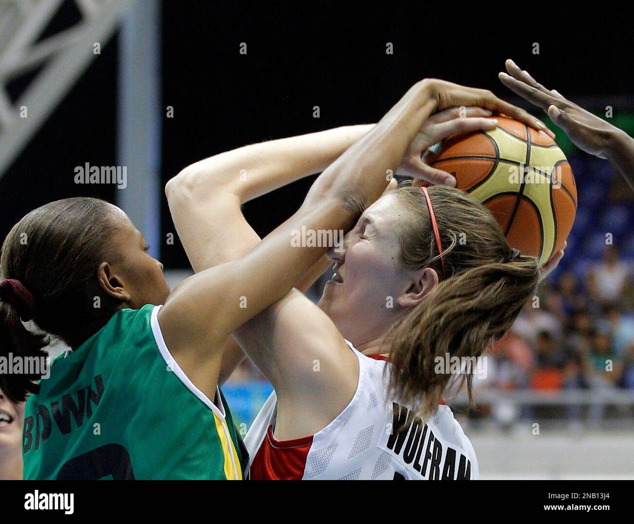 Canada's Emma Wolfram, right, is blocked by Jamaica's Shereel Brown ...