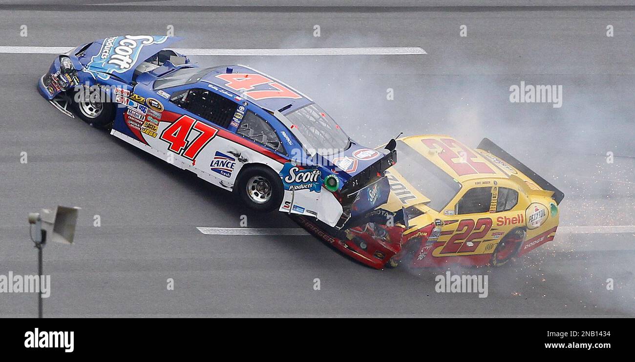 Bobby Labonte (47) and Kurt Busch (22) collide in Turn 2 during the ...