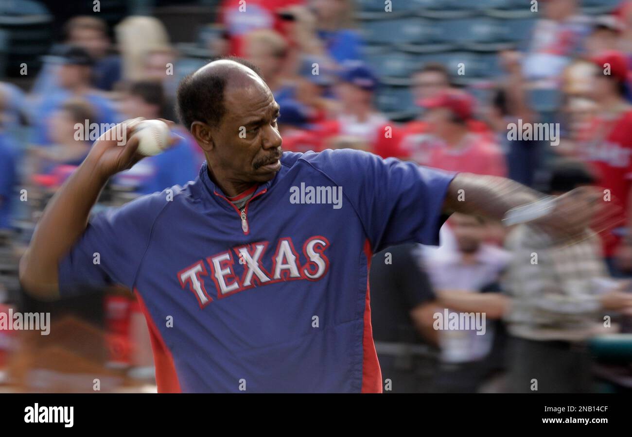 Texas Rangers manager Ron Washington throws before Game 4 of baseball's ...