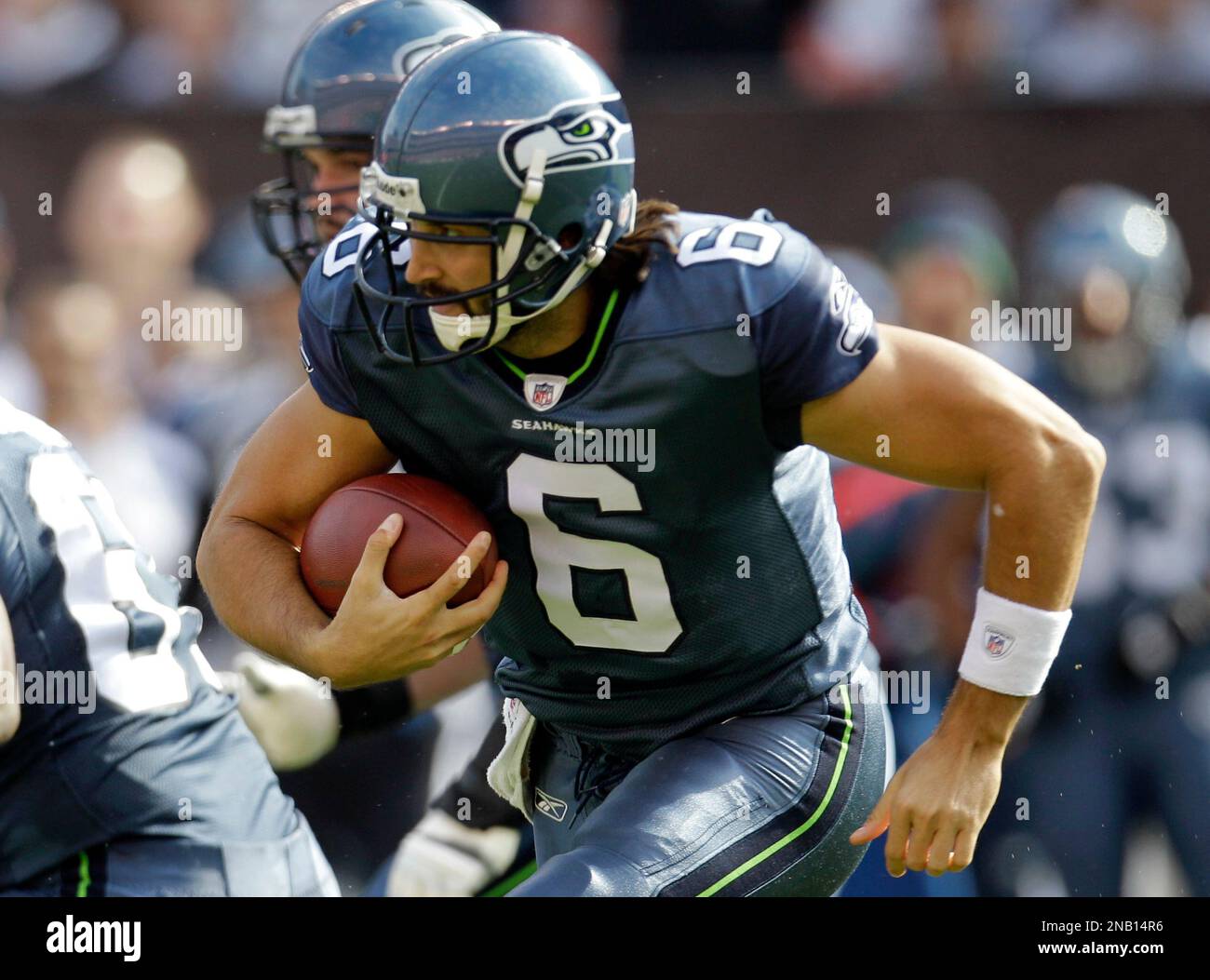 Seattle Seahawks quarterback Charlie Whitehurst (6) runs the ball ...