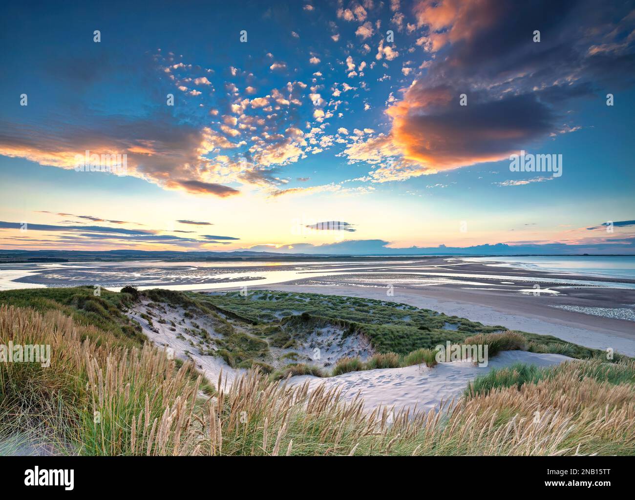 Sunset coast northumberland beach hi-res stock photography and images ...