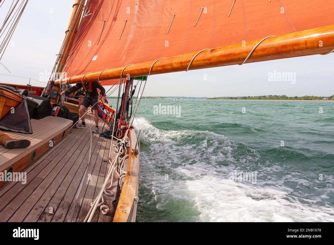 On board the traditional gaff cutter "Jolie Brise" as she reaches ...