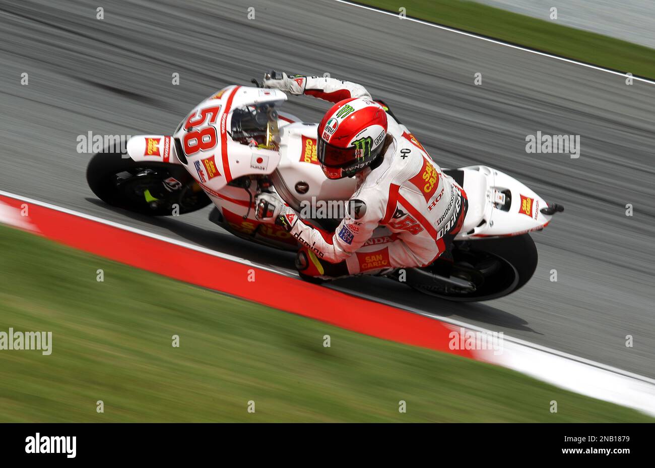 In this photo taken on Saturday, Oct. 22, 2011, MotoGP rider Marco ...