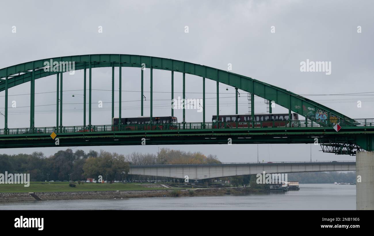 Old bridge across Sava river in Belgrade, green arch bridge Stock Photo ...