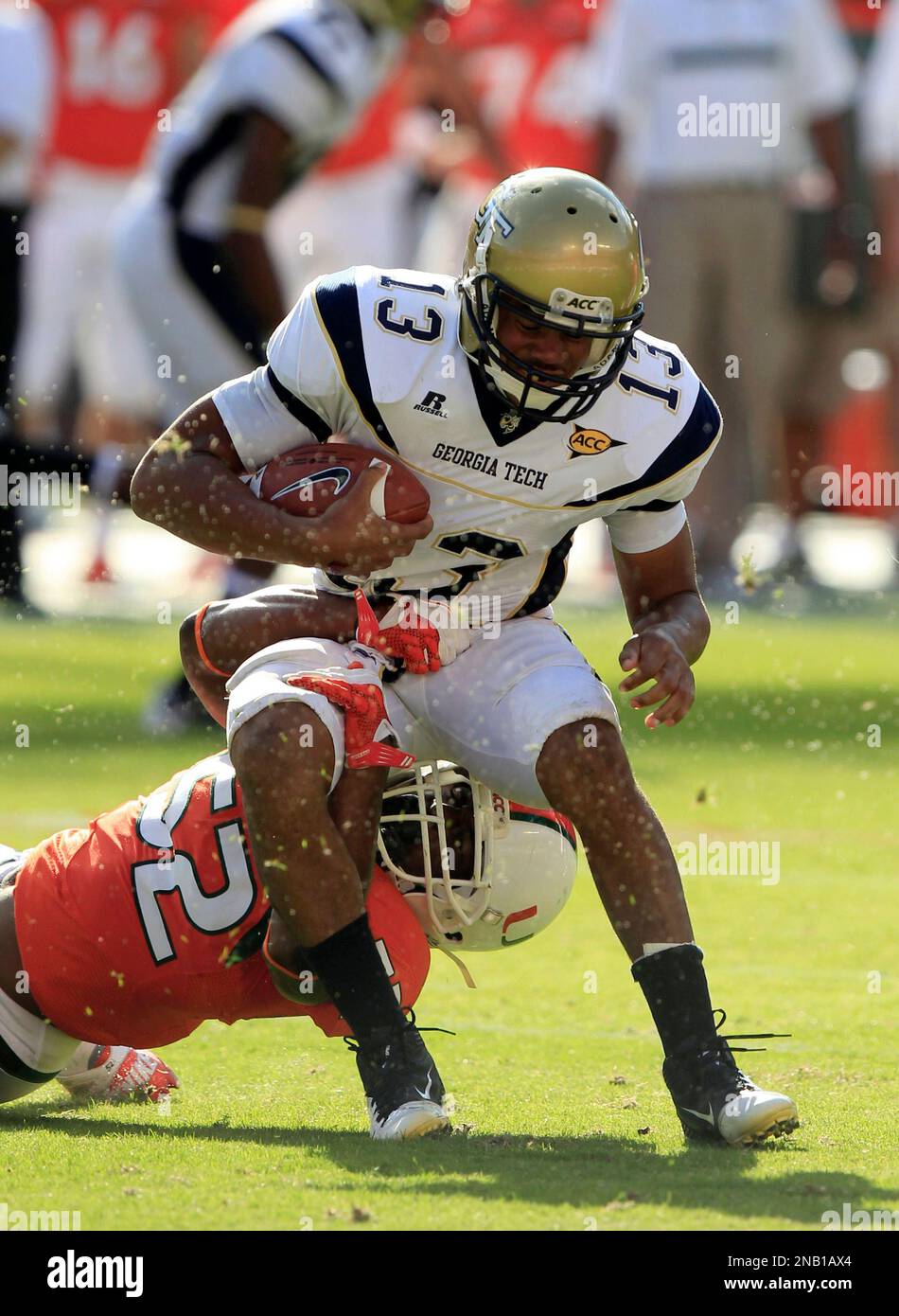 Georgia Tech quarterback Tevin Washington (13) is sacked by Miami ...
