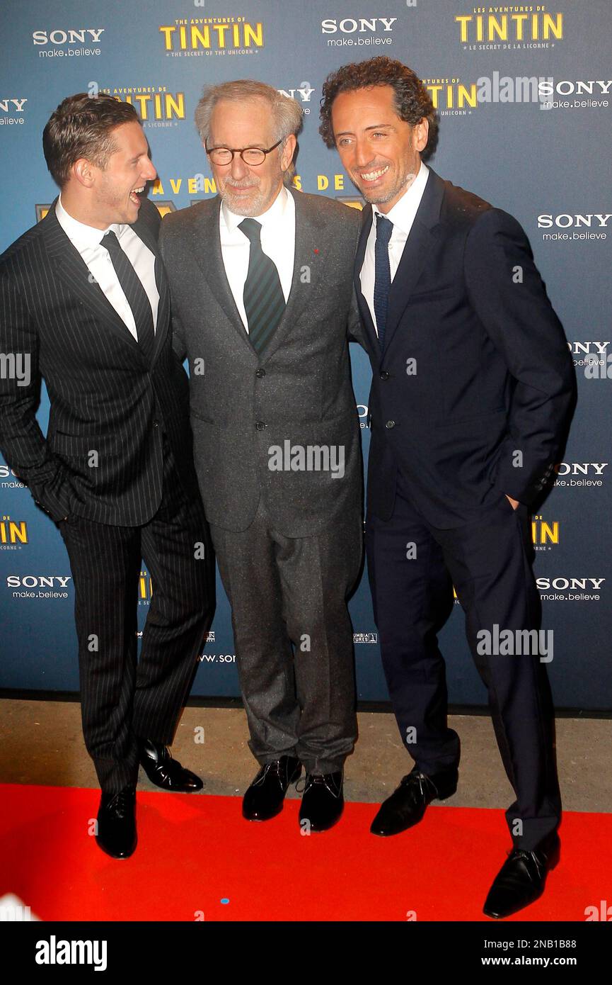 Director Steven Spielberg, center, British actor Jamie Bell, left, and ...