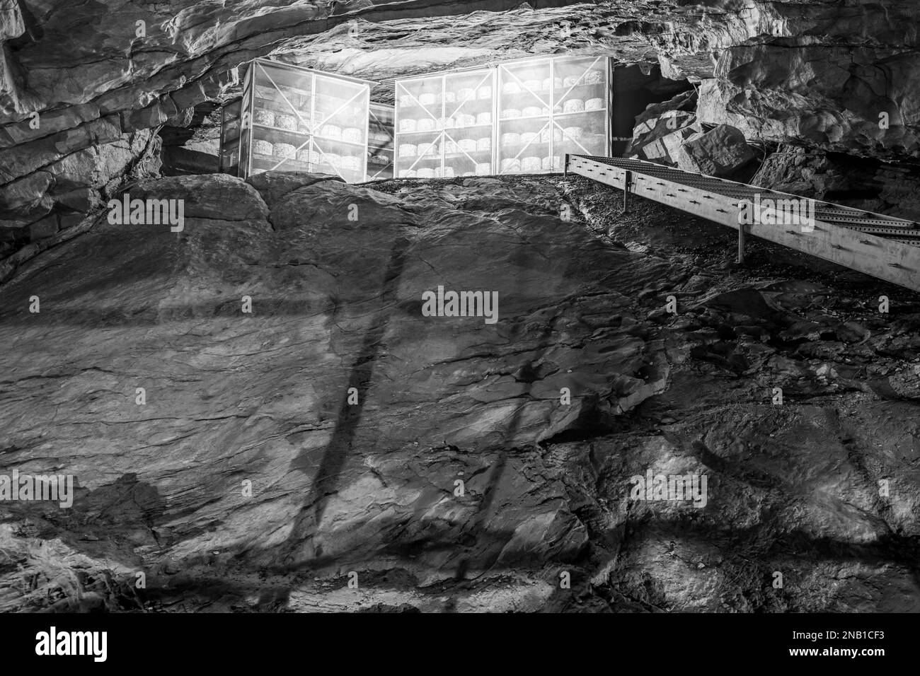 Cheddar cheese maturing in Goughs Cave in Cheddar in Somerset Stock ...