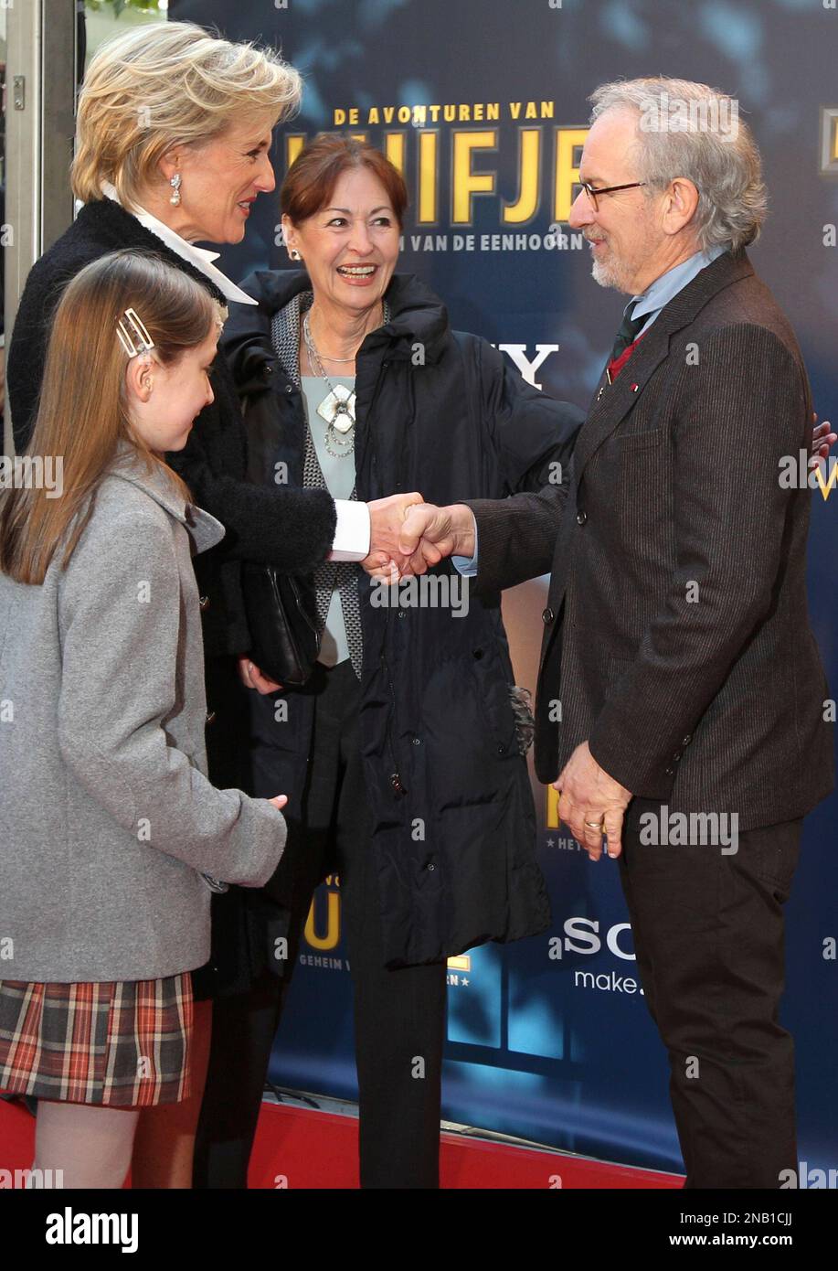 Movie director Steven Spielberg, right, shakes hands with Belgian ...