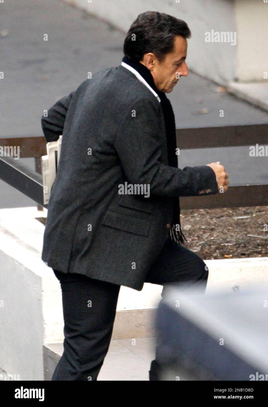 French President Nicolas Sarkozy arrives at the clinic where French ...