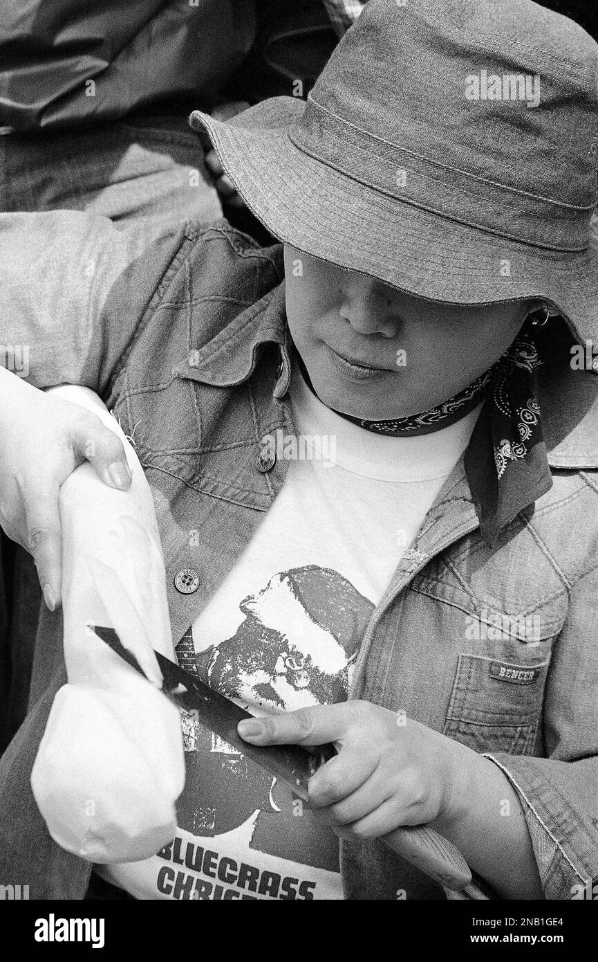 Participant in fertility rite dedicated to Kanamara deities of Shinto ...