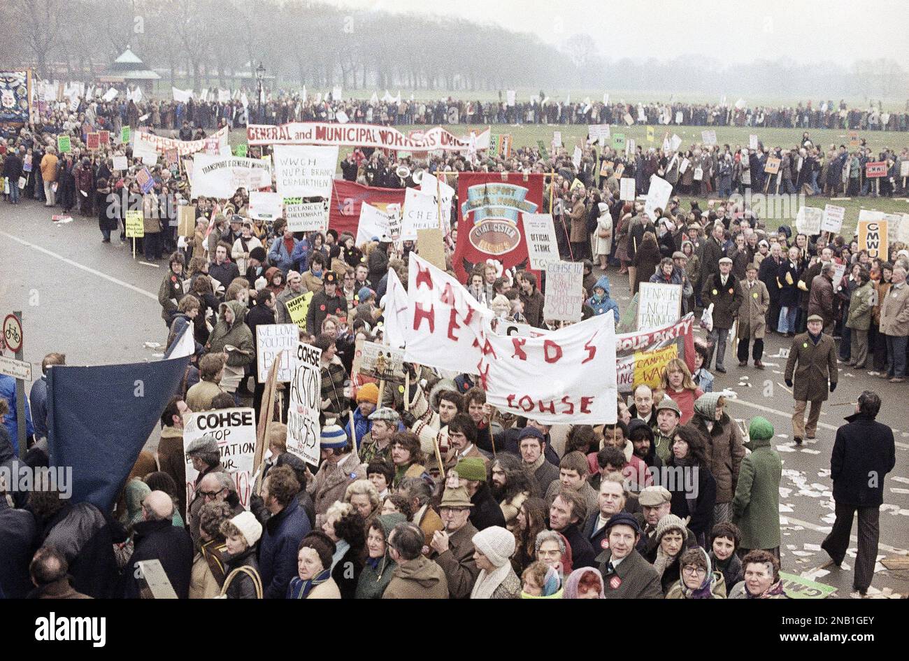 Striking government employees rally for pay raises and other benefits ...