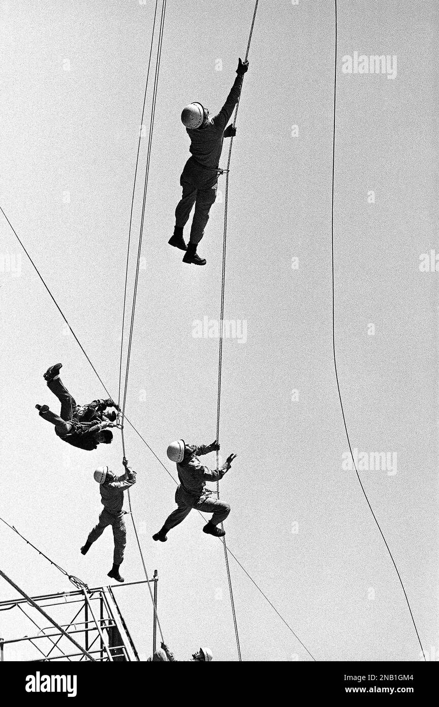 Rescue workers of the Tokyo fire department use ropes during the annual ...