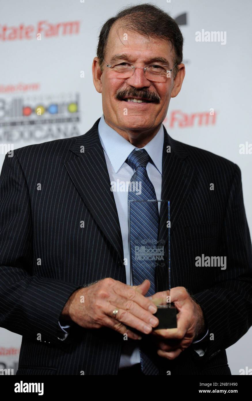 Rene Camacho, of La Arrolladora Banda el Limon, poses backstage at the ...