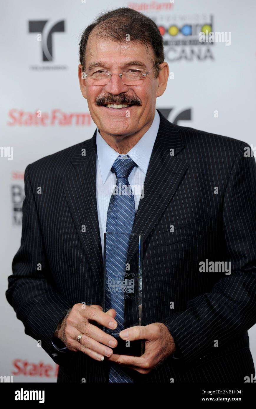 Rene Camacho, of La Arrolladora Banda el Limon, poses backstage at the ...