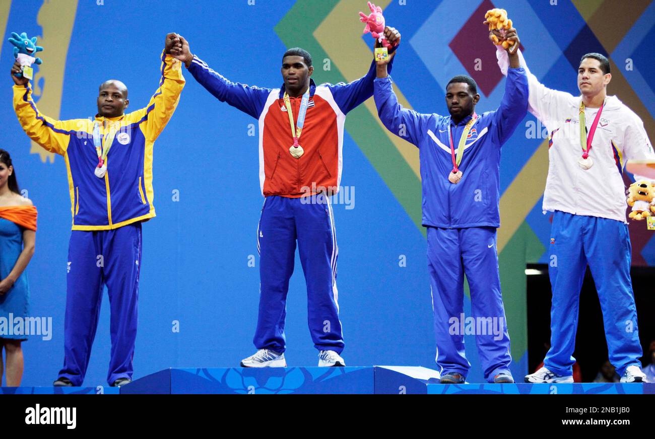 Athletes, from left, silver medal winner Colombia's Cristian Mosquera ...