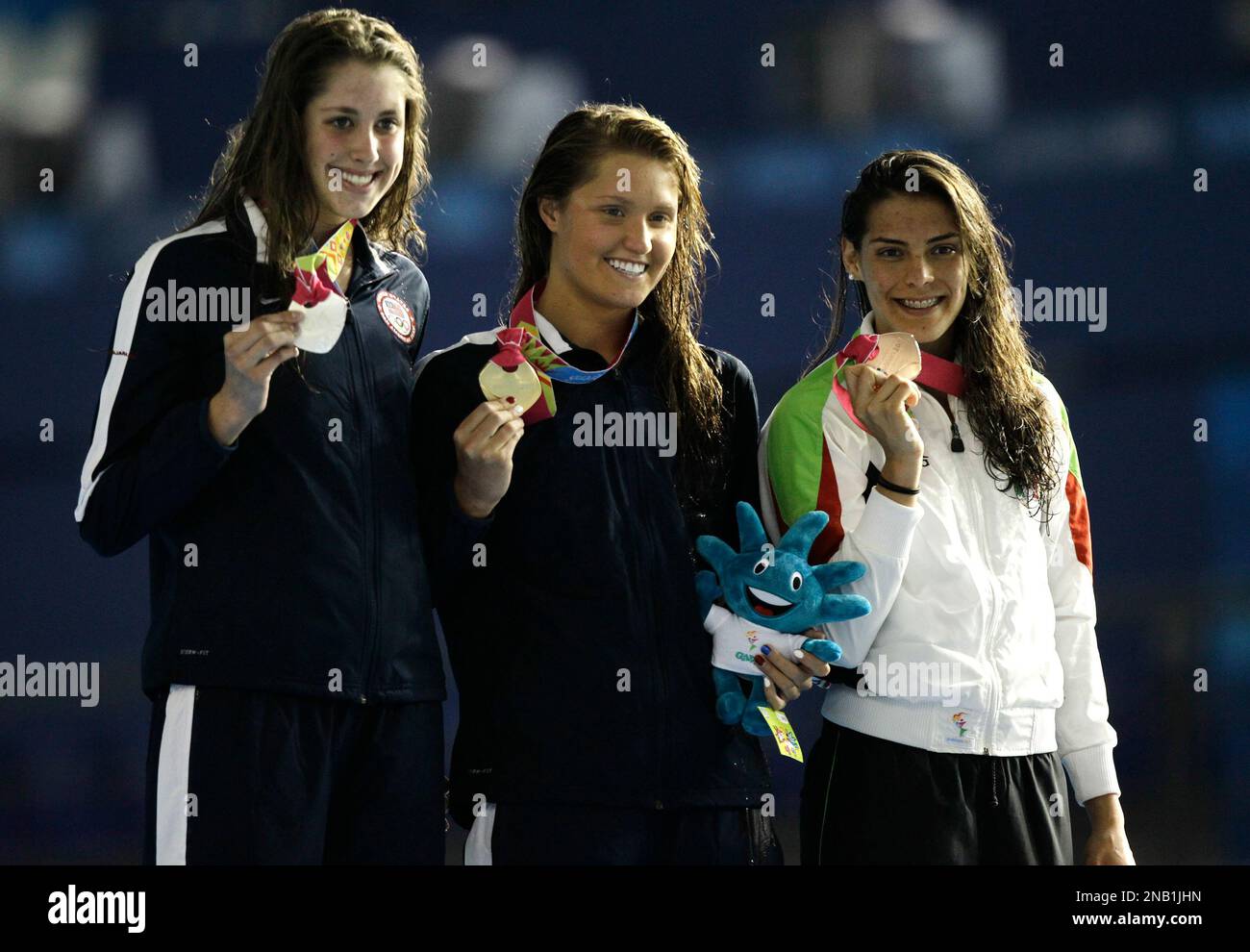 Anne Pelton, gold medal, center, Bonnie Brandon, silver medal, left, of ...