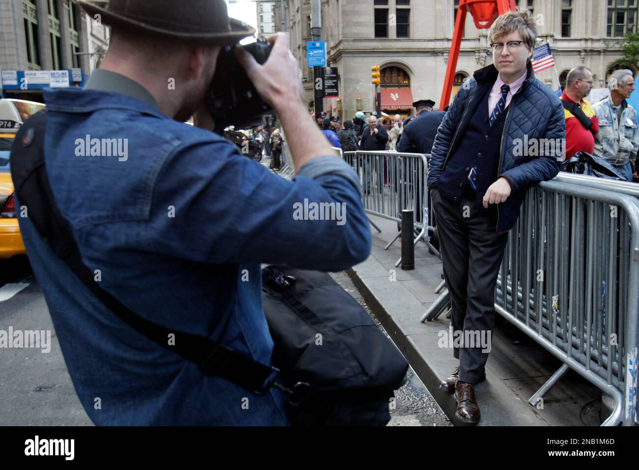 Detective Rick Lee, right, poses for a photographer in Zuccotti Park in ...