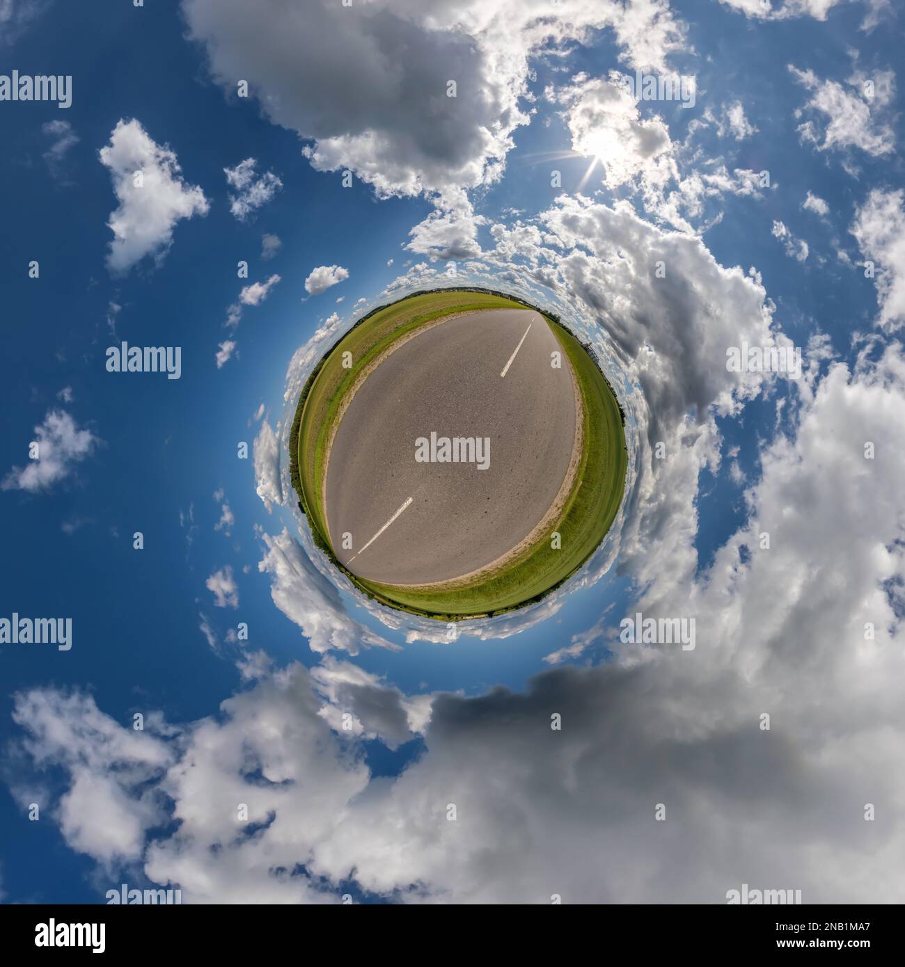 tiny planet in blue overcast sky with beautiful clouds with ...