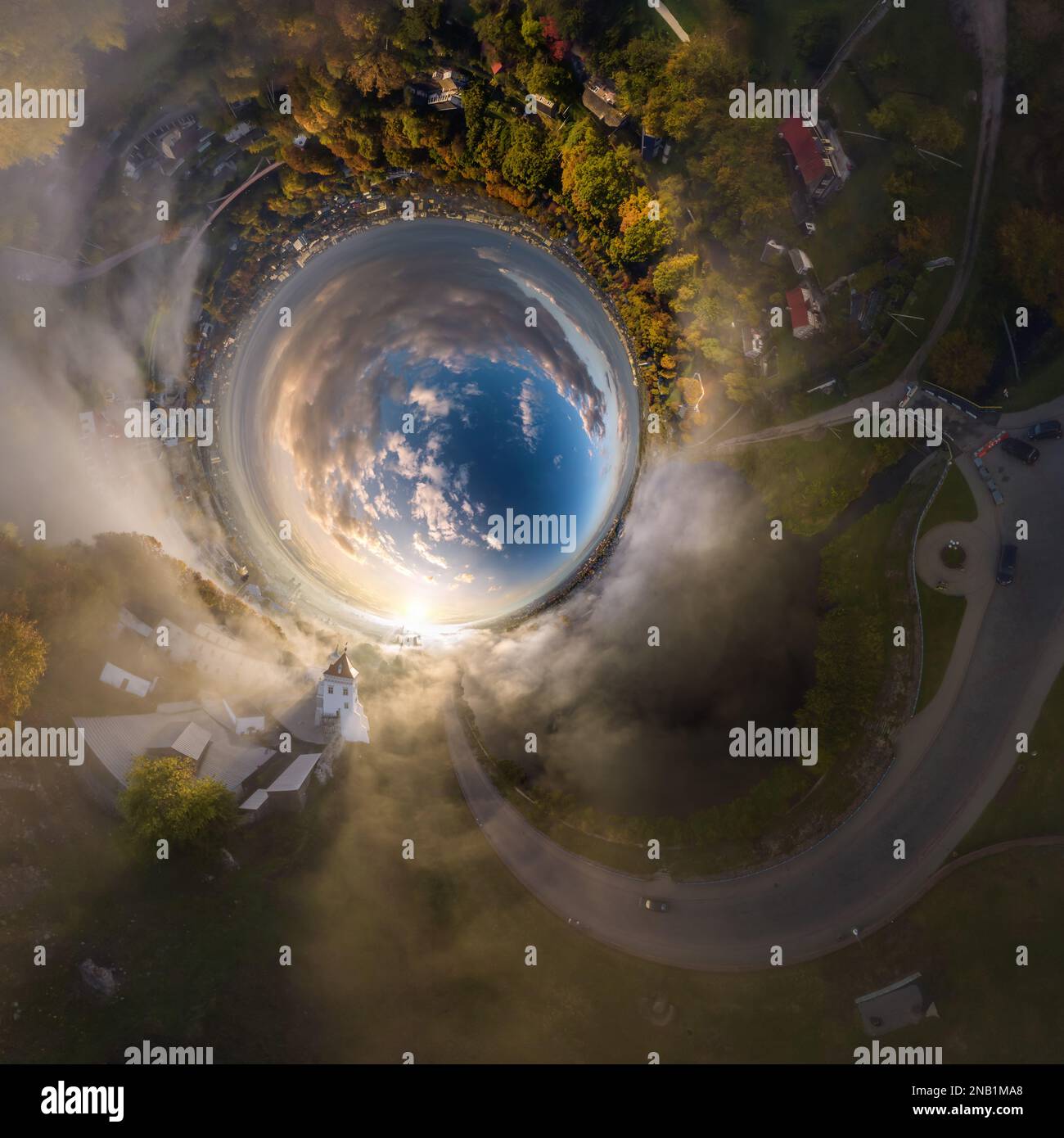 blue sphere inside overlooking old town with fog, urban development ...