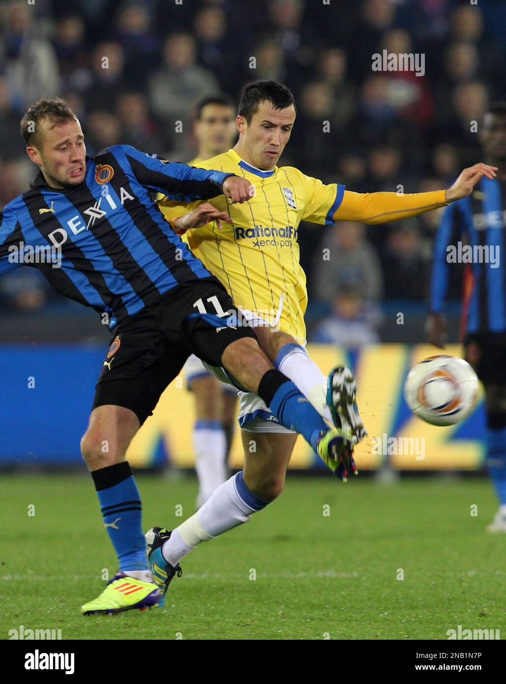 England's Birmingham City FC player Keith Fahey, right, challenges ...