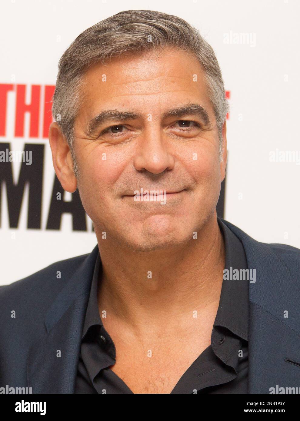 US actor and director of the film, George Clooney poses for photographs ...