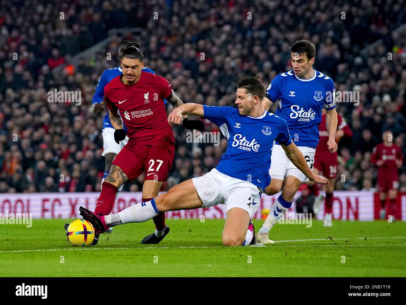 Everton's James Tarkowski fouls Liverpool's Darwin Nunez during the ...