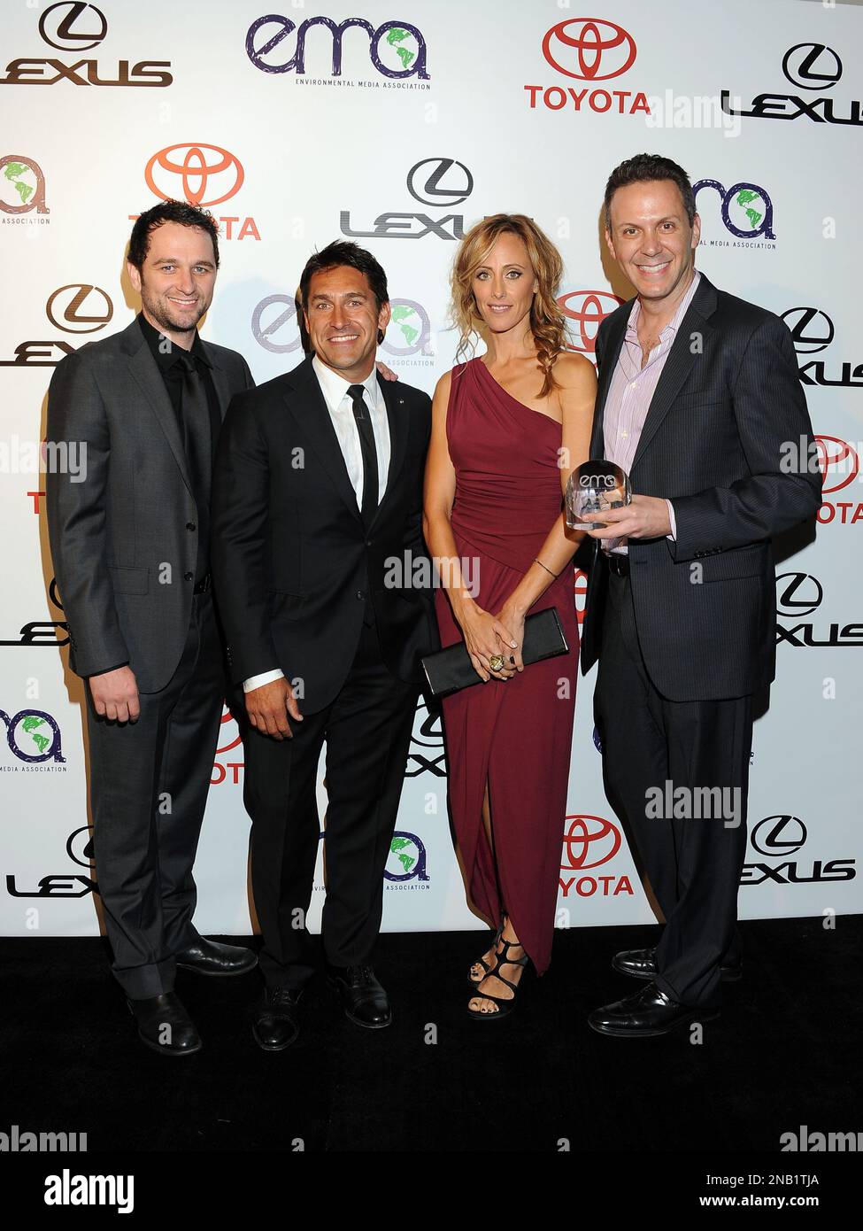 Matthew Rhys, left, and Kim Raver, third from left, pose backstage with ...