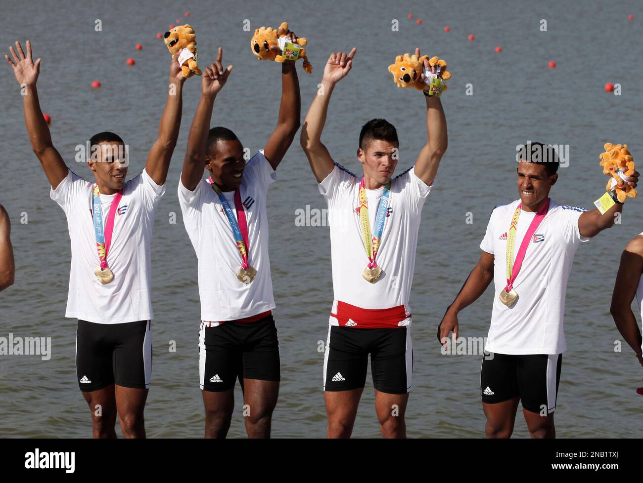Cuba men's rowing team celebrate their gold medals during an awards ...