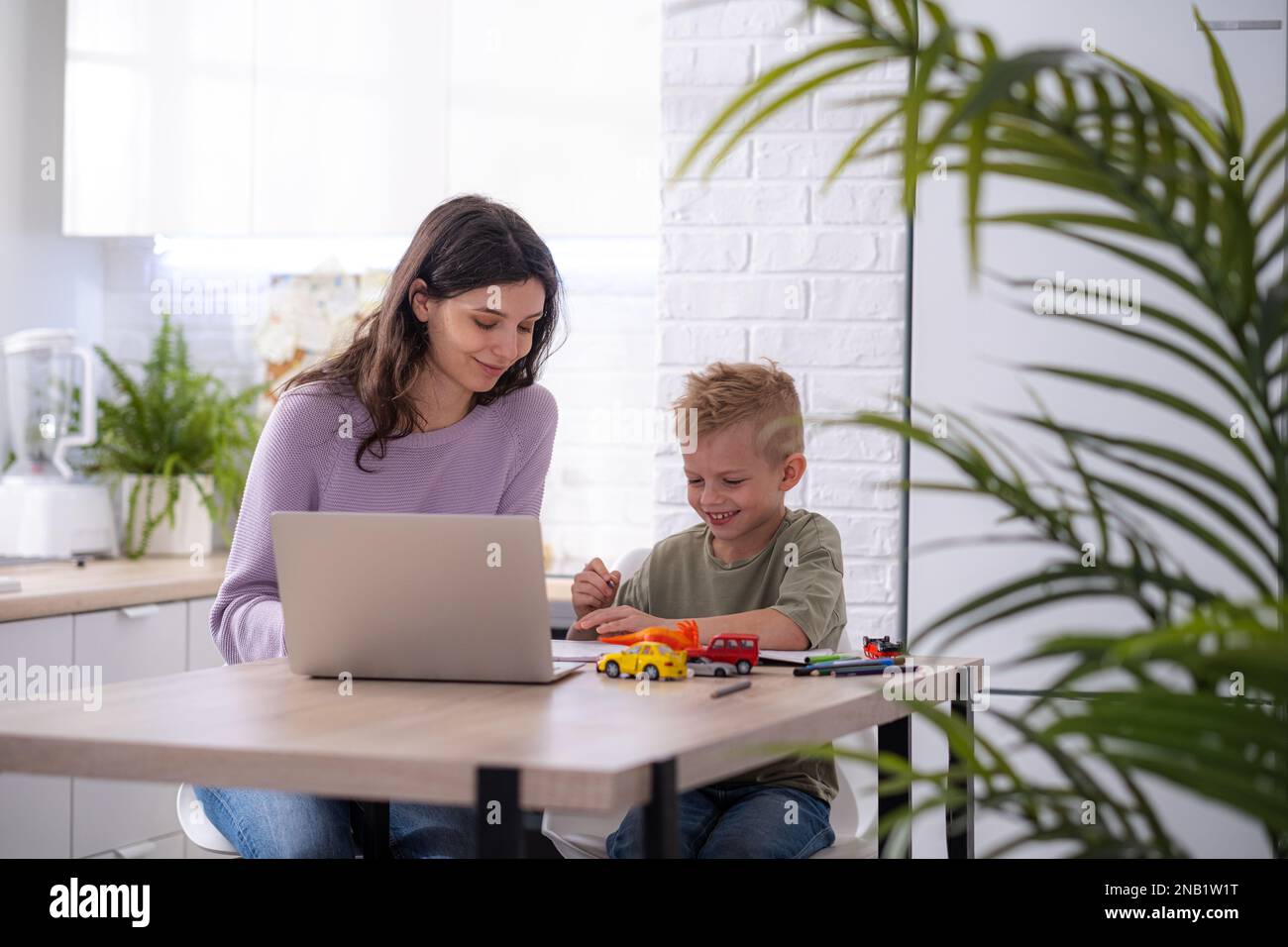 Work from home and family education, Mom and son using remote access ...