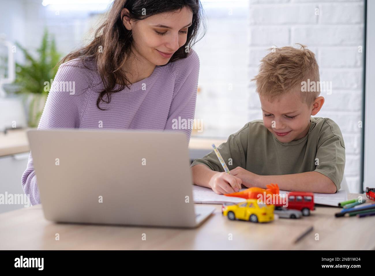 Work from home and family education, Mom and son using remote access ...