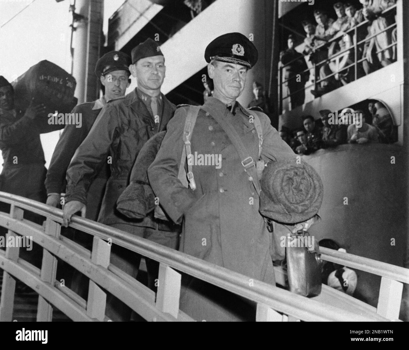 Carrying his own luggage, a German admiral, said by Army officials to ...