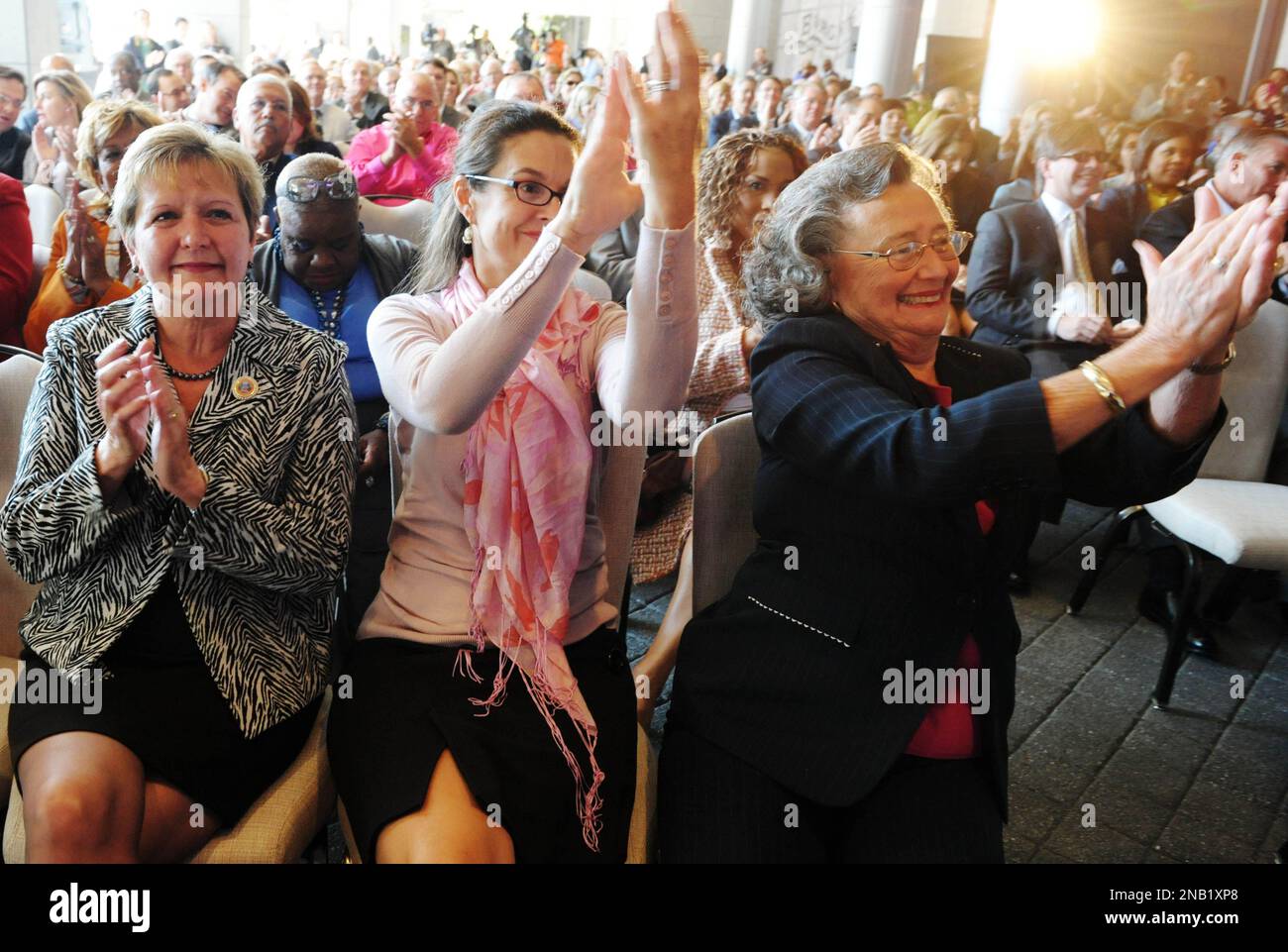 From left to right, New Orleans City Council members Susan Guidry ...