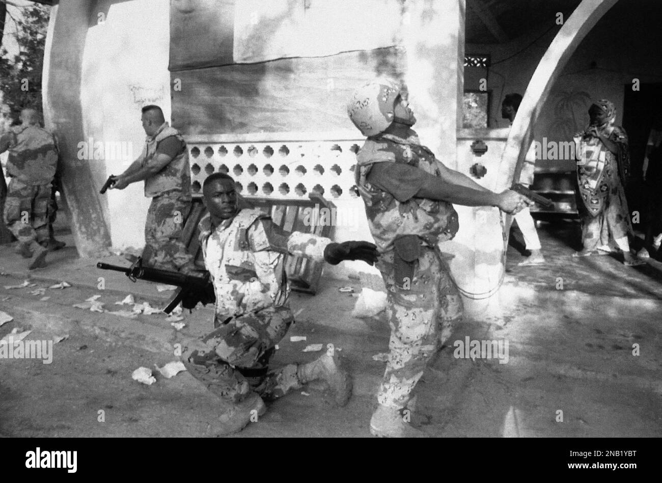 U.S. Marines move into a Mogadishu portside compound on Friday, Dec. 18 ...