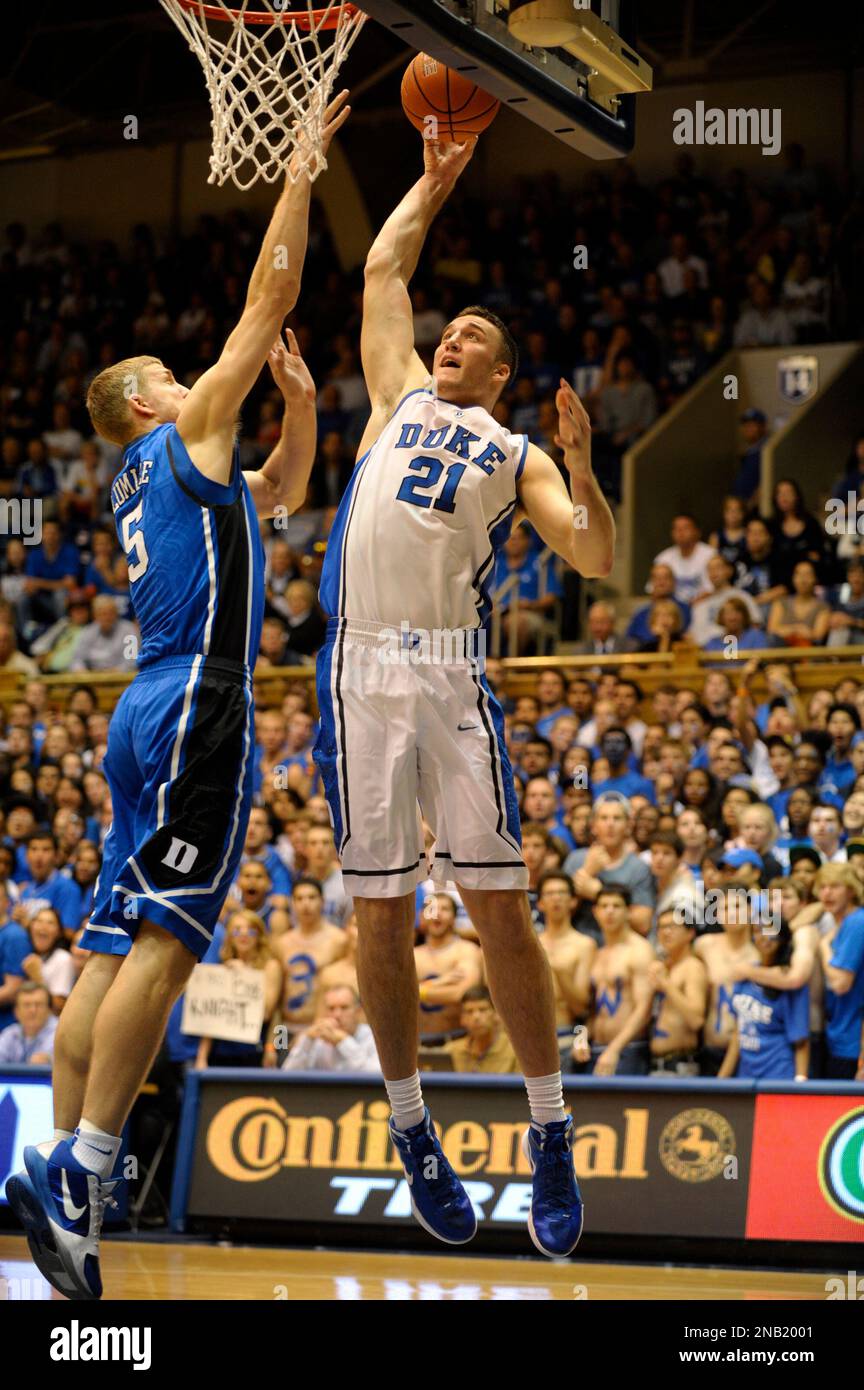 Duke's Miles Plumlee (21) dunks over his brother Mason Plumlee (5 ...