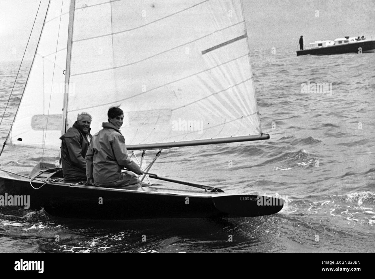 Prince Charles, right, at the helm of the Flying Fifteen “Labrador, as ...
