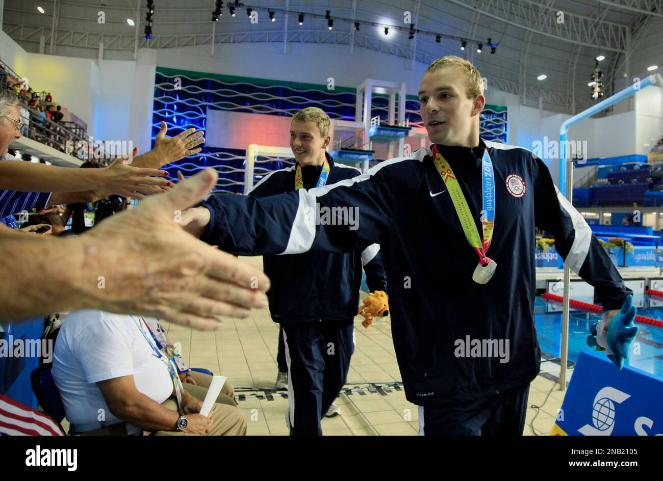 Silver medalist Ryan Freeley, of the United States, right, and gold ...
