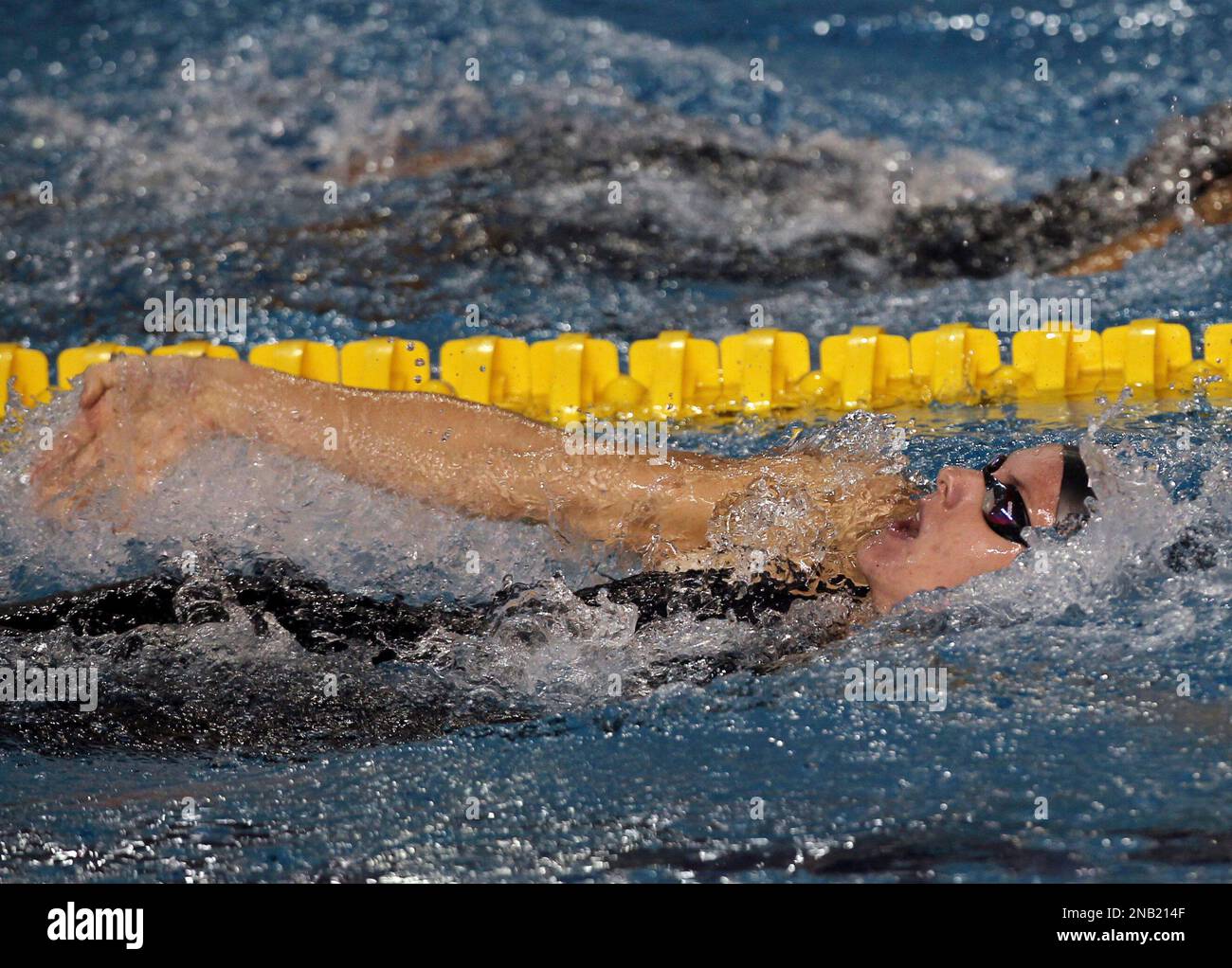 Julia Smit, of the United States, strokes to win the gold medal for the ...