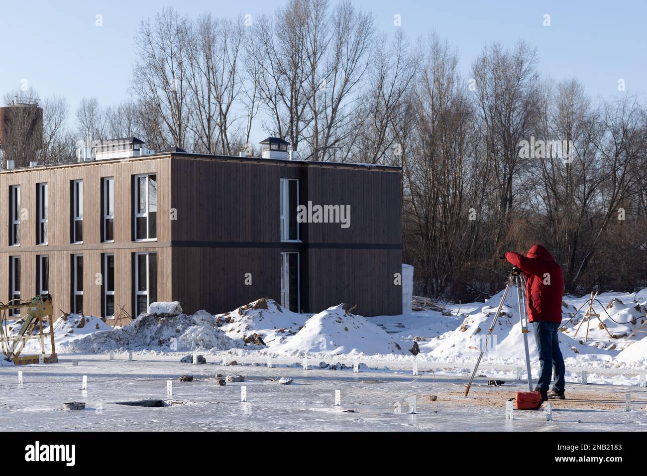 Surveyor Engineering. A man looks into a geodesic telescope at a ...