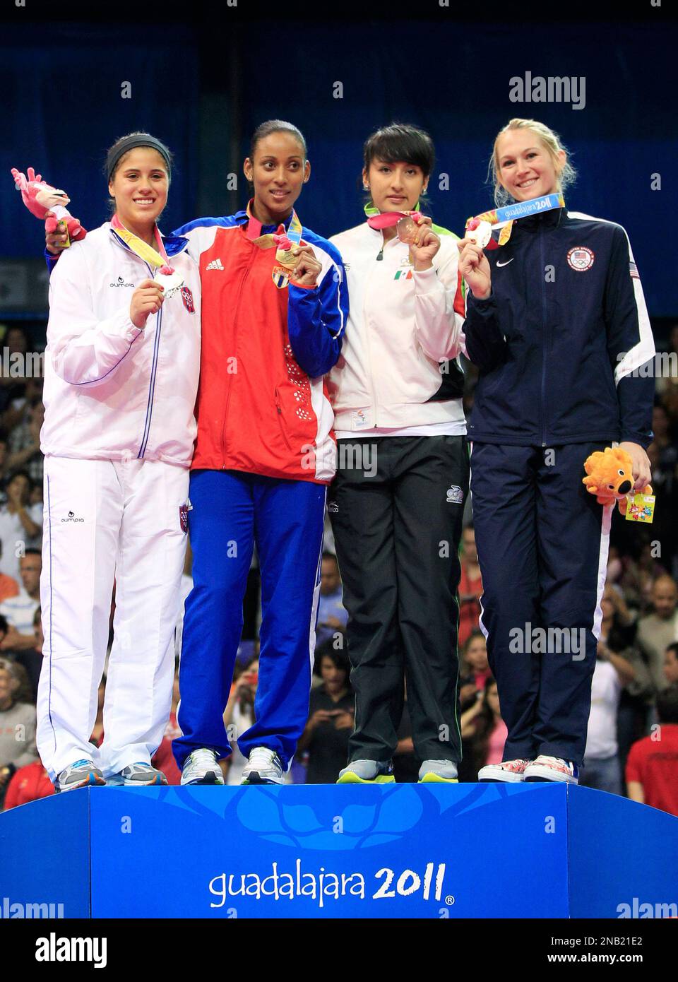 Athletes, from left, silver medalist Puerto Rico's Nikki Martinez, gold ...