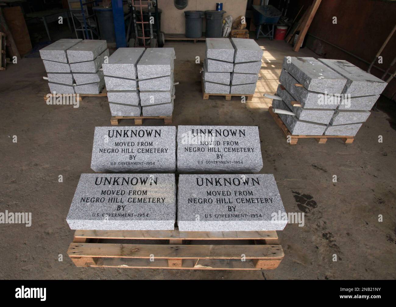 In this photo taken Monday, Oct. 3, 2011, newly made headstones to ...