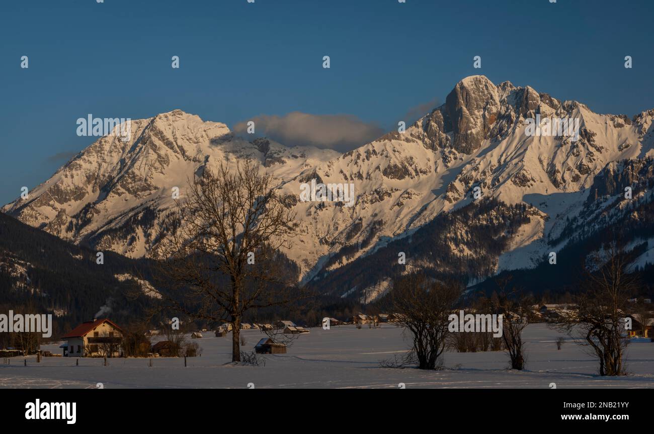 Winter landscape near Hall village and Admont town with big snowy hills ...