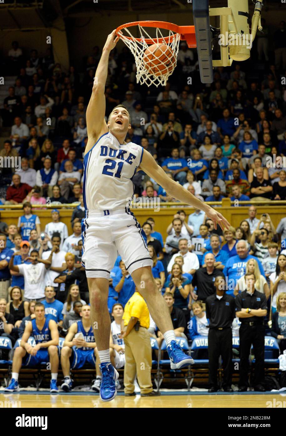 Duke's Miles Plumlee (21) dunks during a dunk contest at the Countdown ...