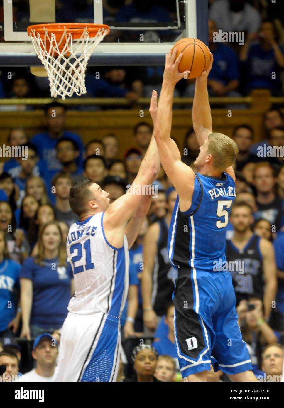 Duke's Miles Plumlee (21) tries to block his brother Mason Plumlee (5 ...